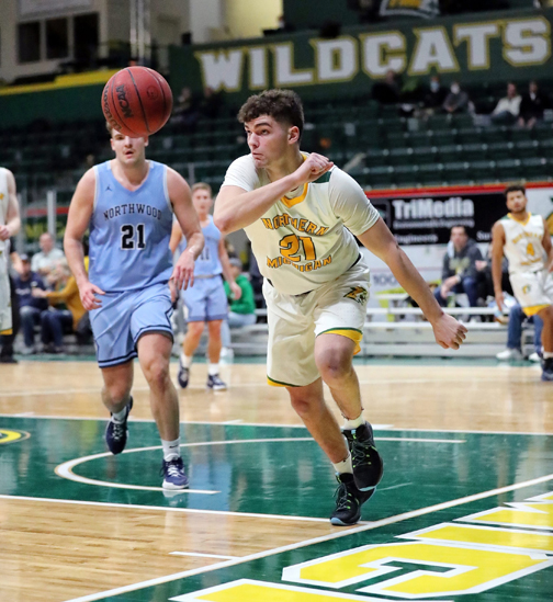 Battle for the top: Northern Michigan University men’s basketball team ...